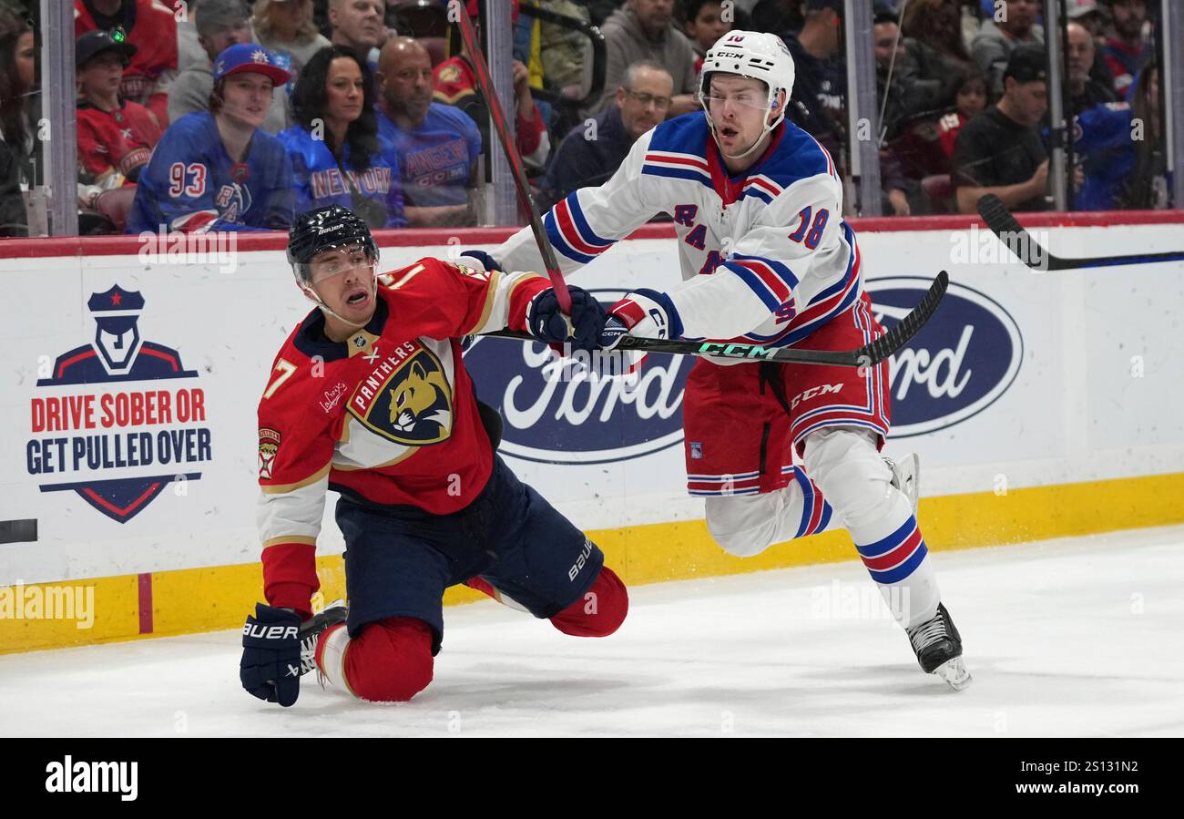Florida Panthers center Evan Rodrigues (17) falls to the ice as he ...