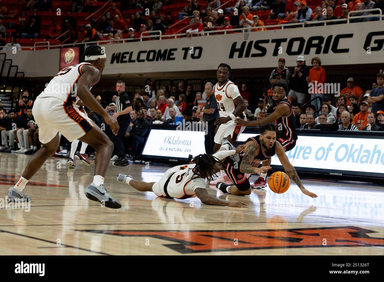 Houston guard Emanuel Sharp and Oklahoma State guard Khalil Brantley ...
