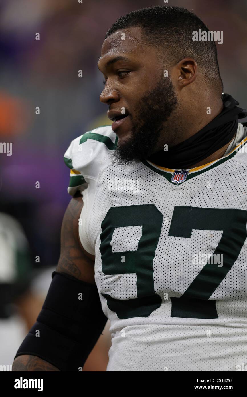 Green Bay Packers defensive tackle Kenny Clark talks on the sideline ...
