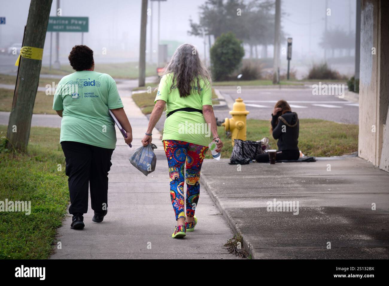 Hudson, Florida, USA. 30th Dec, 2024. Two members of the Metro BrigAIDe ...