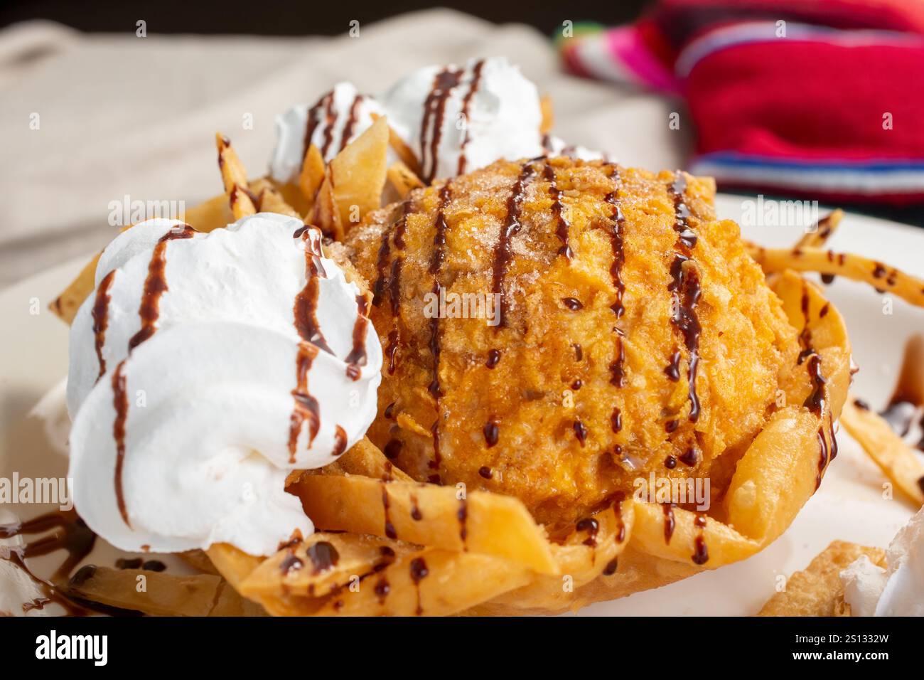 A view of a plate of deep fried ice cream Stock Photo - Alamy
