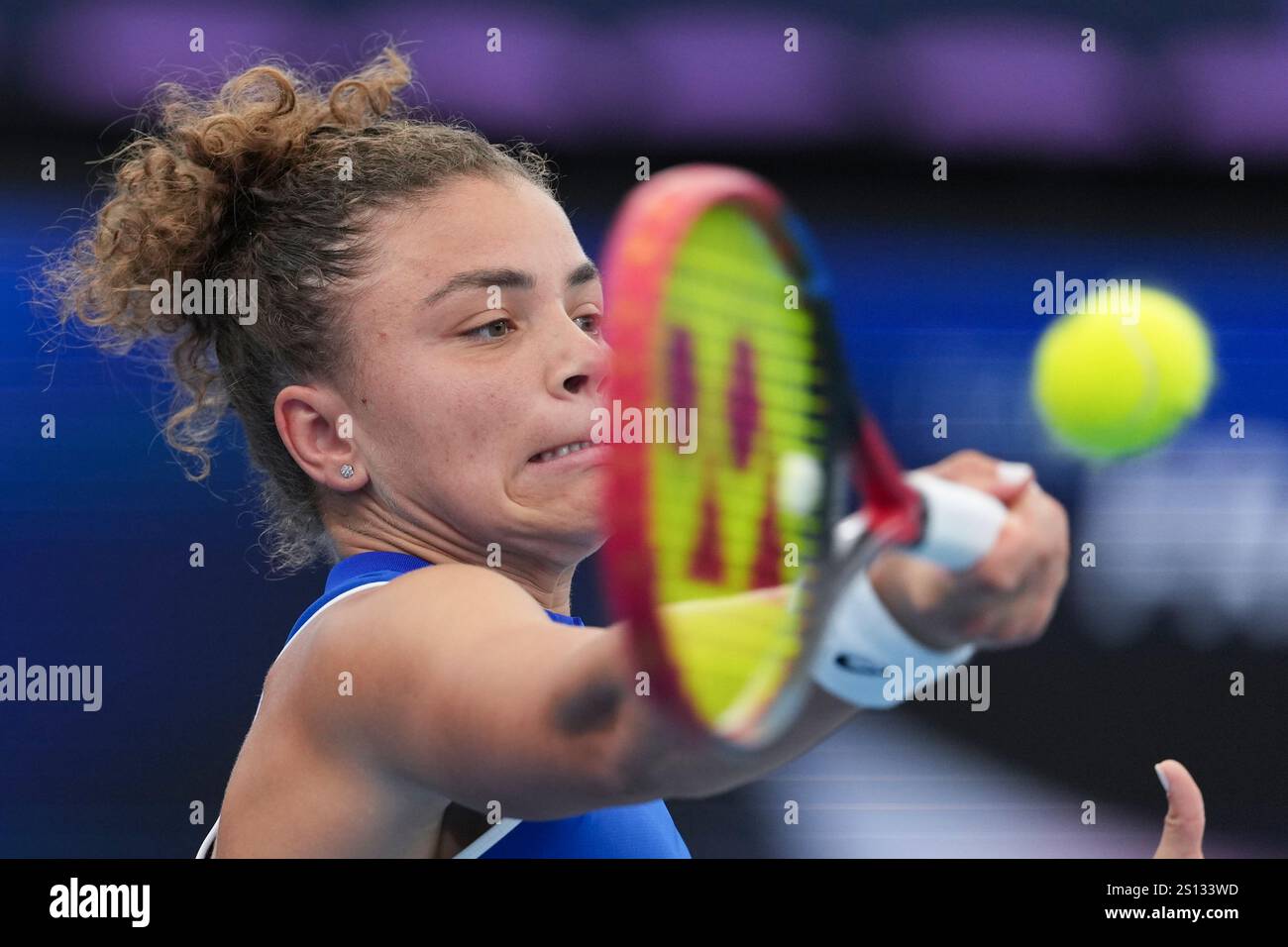Italy's Jasmine Paolini plays a forehand return to France's Chloe ...