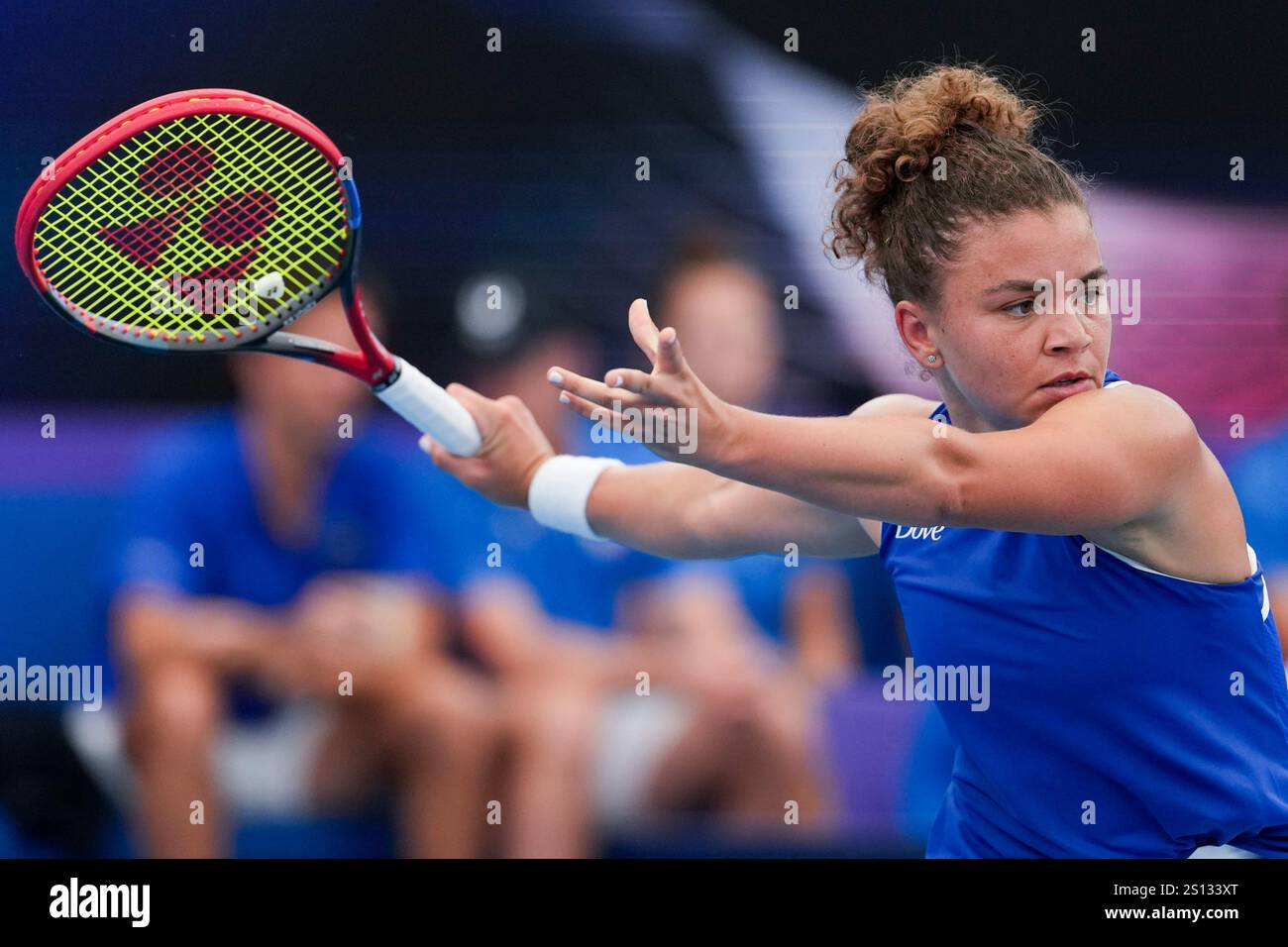Italy's Jasmine Paolini plays a forehand return to France's Chloe ...