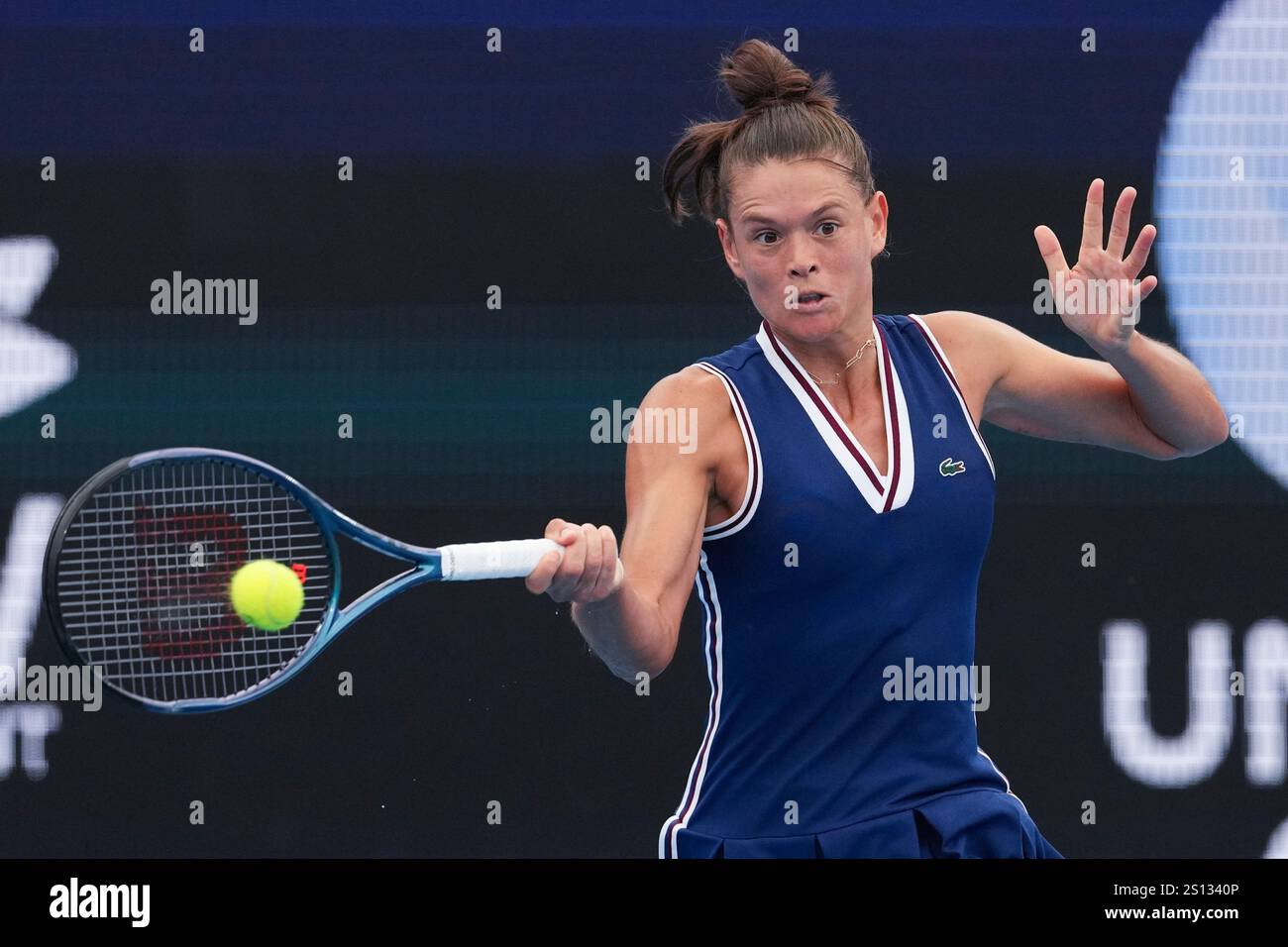 France's Chloe Paquet plays a forehand return to Italy's Jasmine ...