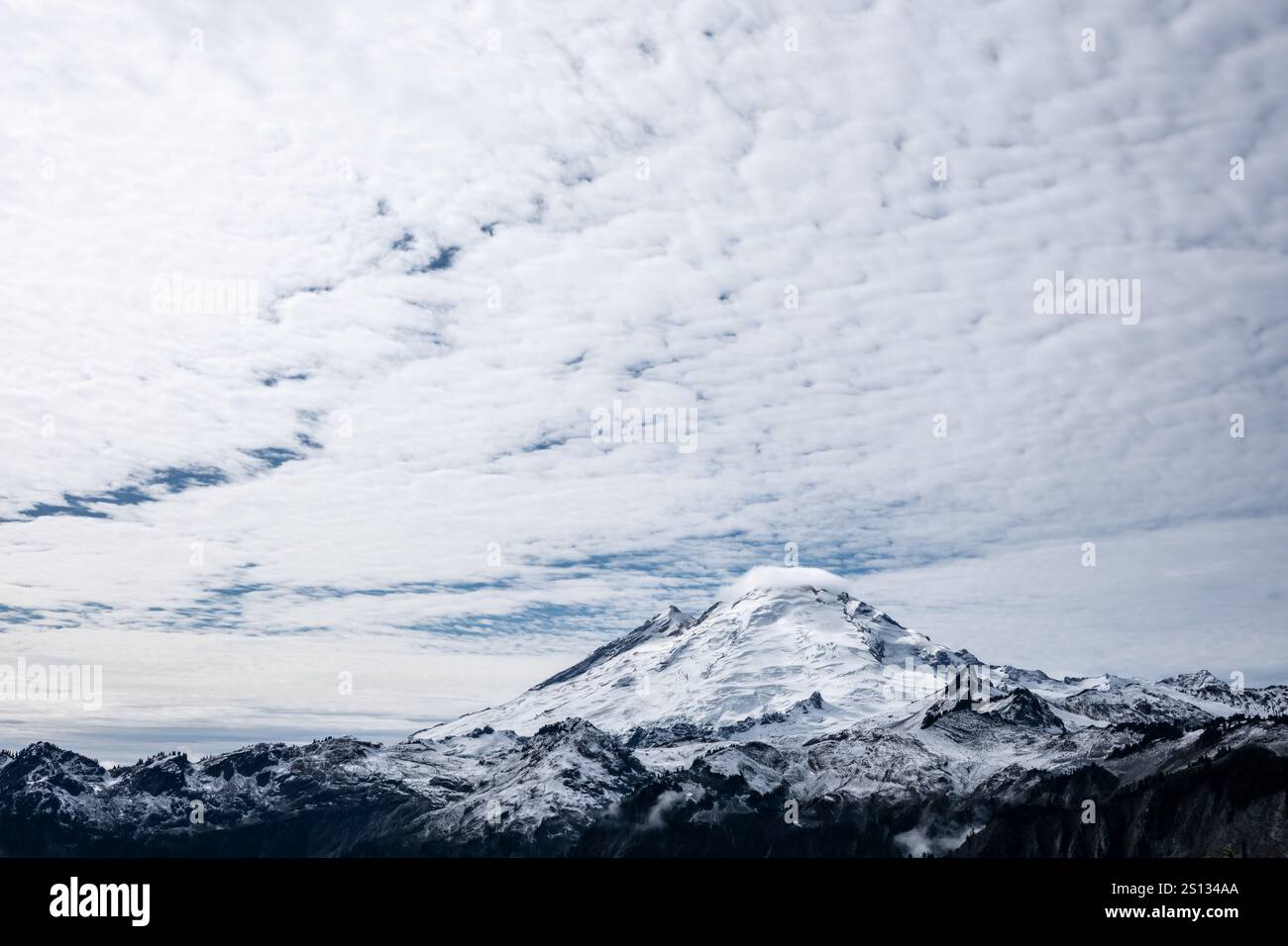Blue patches of sky indicate clearing pattern in the clouds that ...