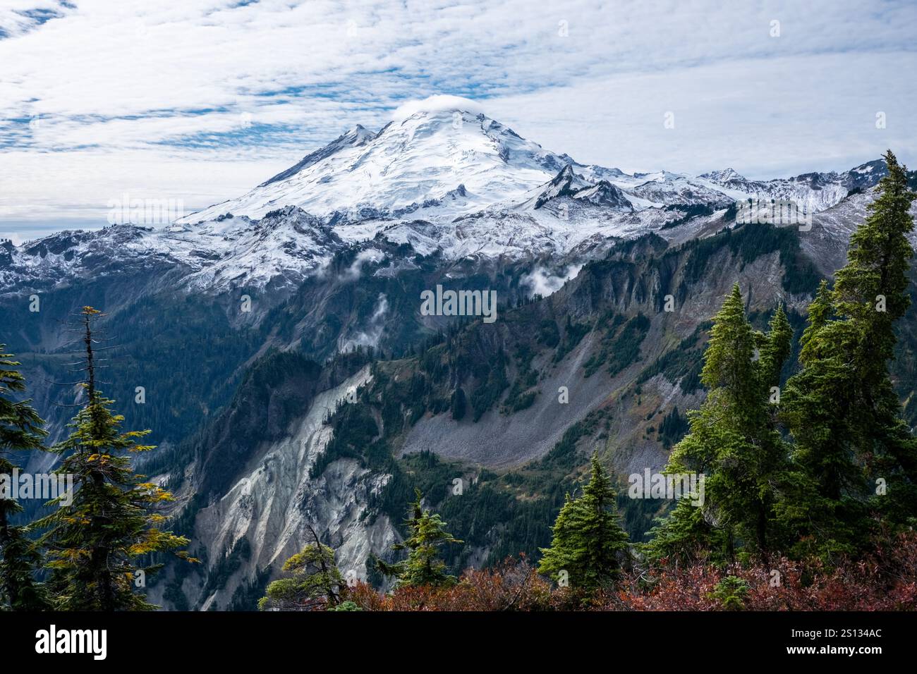 A fluffy white crown of cloud sits atop Mount Baker as seen from Artist ...