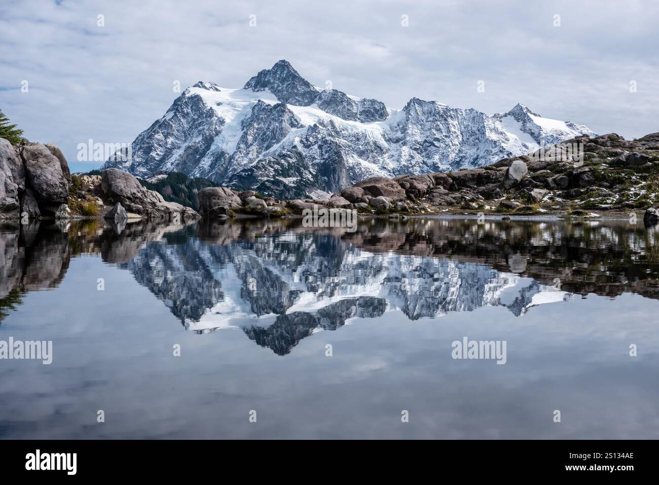 Smooth surface of small lake on Huntoon Point, Washington provides a ...