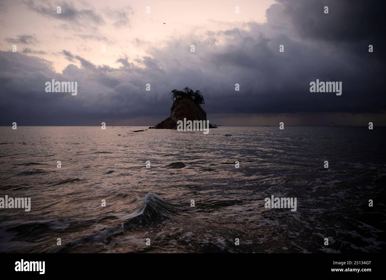 A slight morning glow prevails over Mitsukejima Island in Suzu City ...