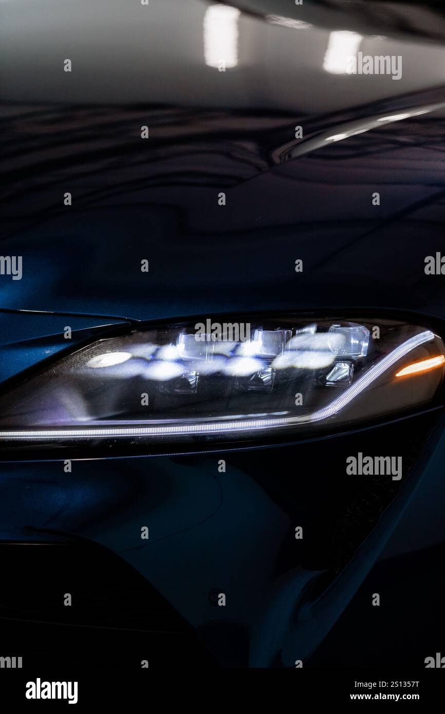 Headlights on Toyota Supra Stock Photo - Alamy