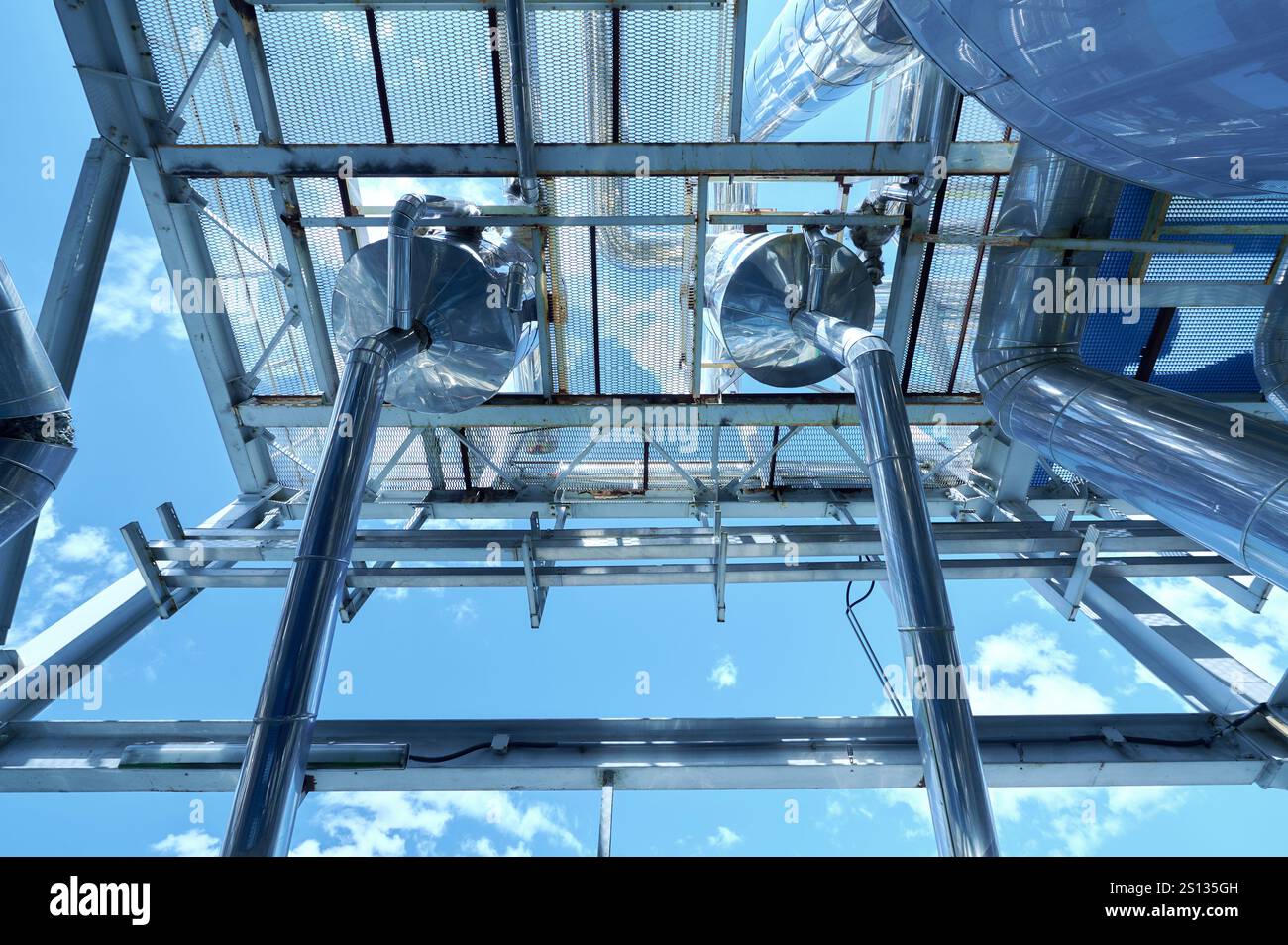 Overview of chemical plant infrastructure featuring pipelines against a ...