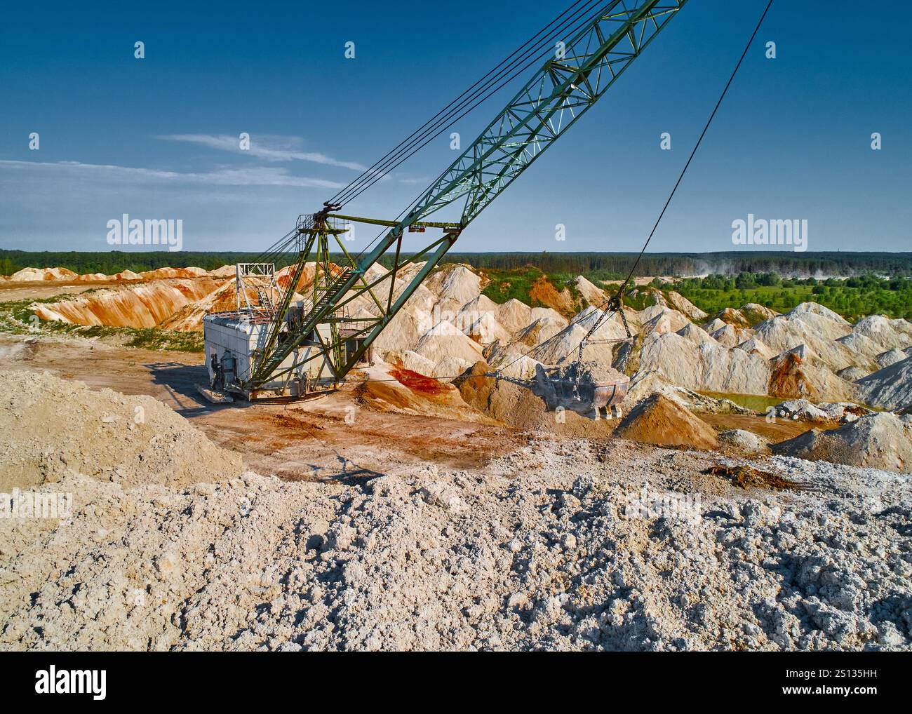 Walking dragline with hoist digs calx in chalkquarry Stock Photo - Alamy