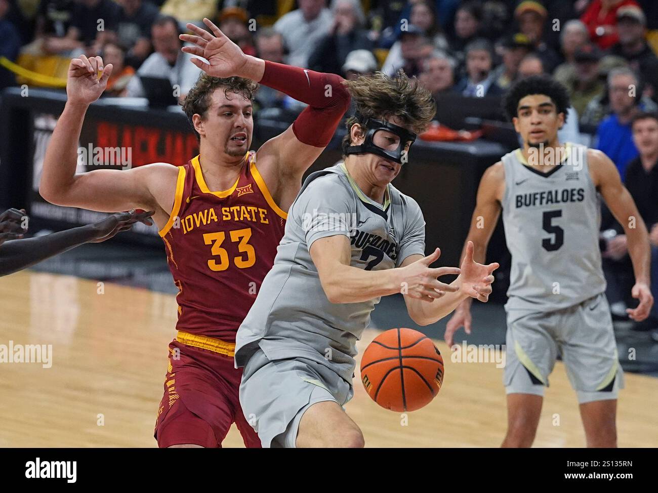 Colorado forward Sebastian Rancik, center, loses control of a rebound ...