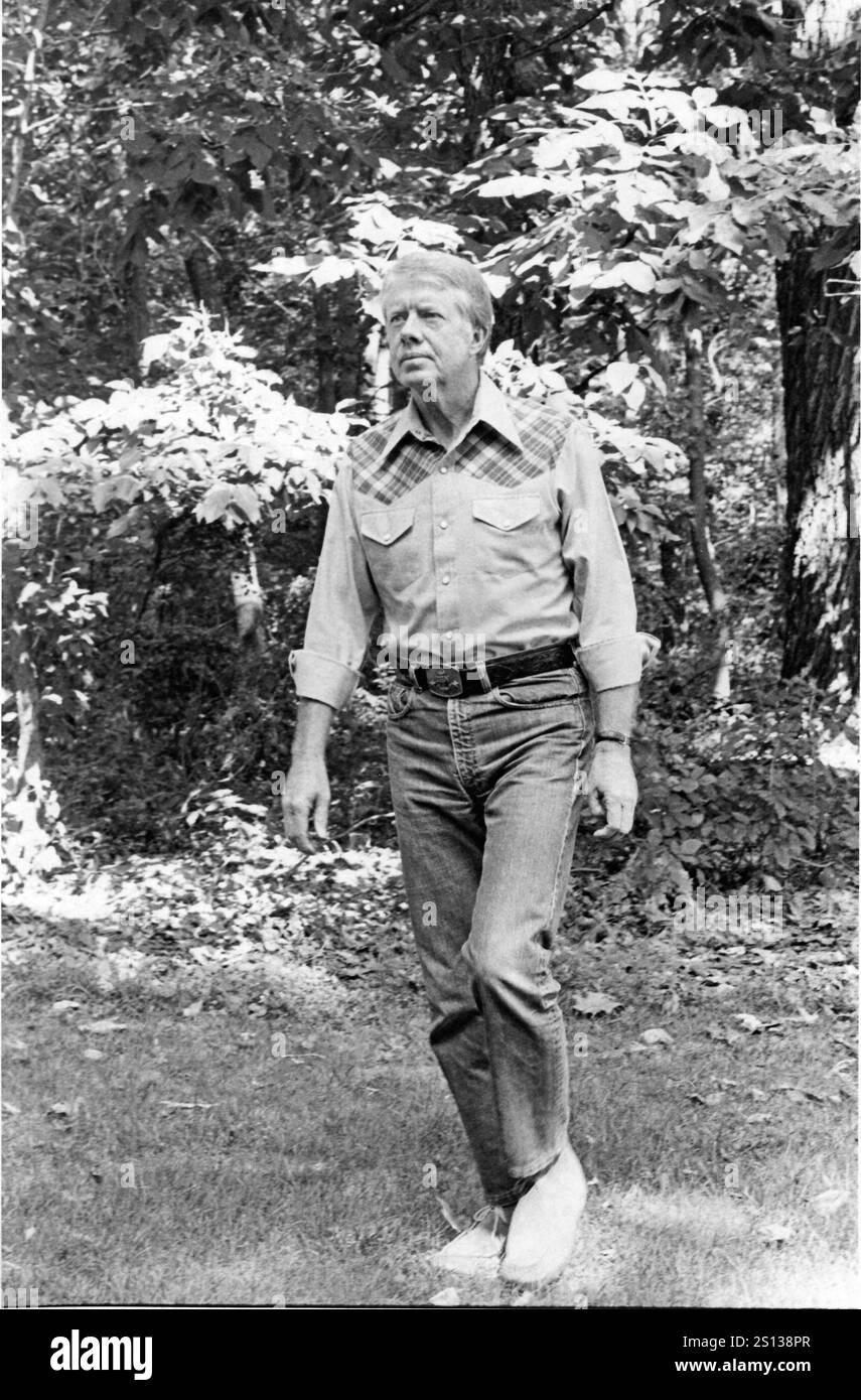 United States President Jimmy Carter takes a relaxing stroll in the ...