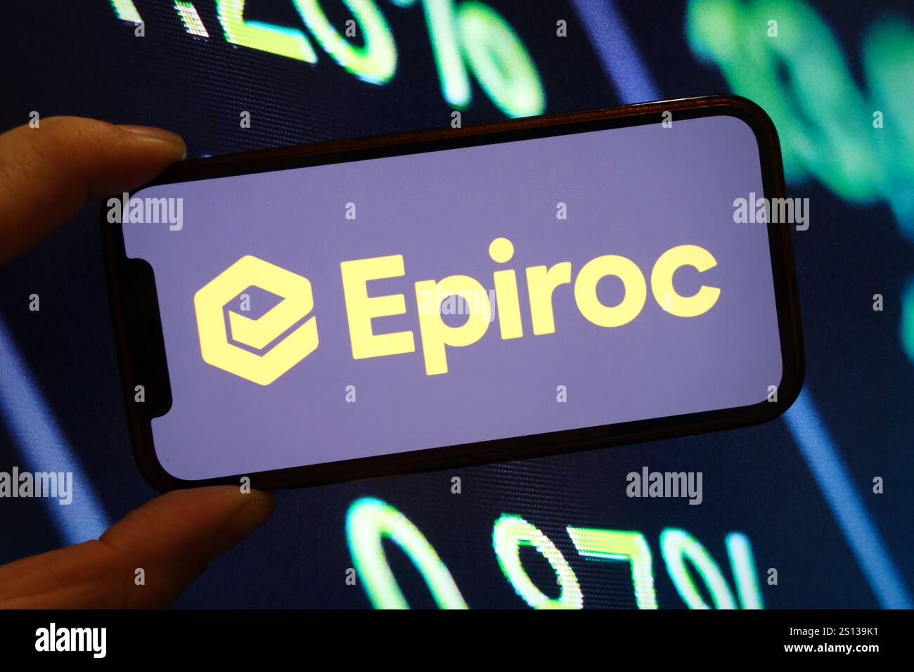 In this photo illustration, the Epiroc company logo is seen displayed on a smartphone screen ...
