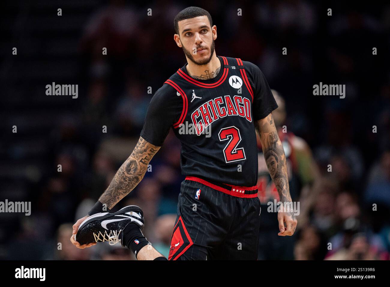 Chicago Bulls guard Lonzo Ball (2) looks on during the first half of an ...
