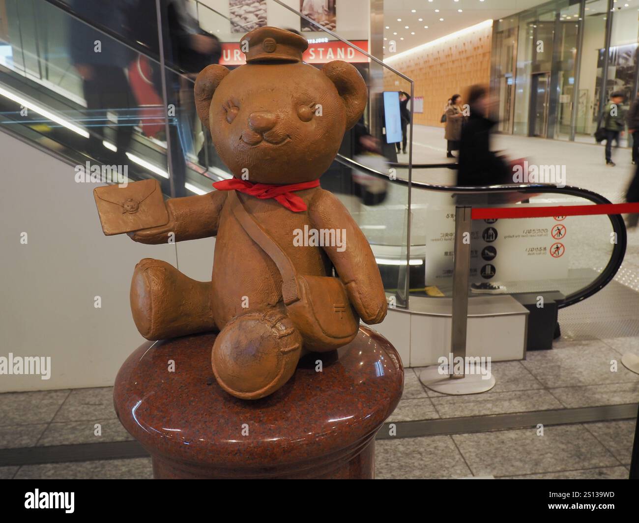 TOKYO, JAPAN - December 26, 2024: A statue of the Japanese post office ...