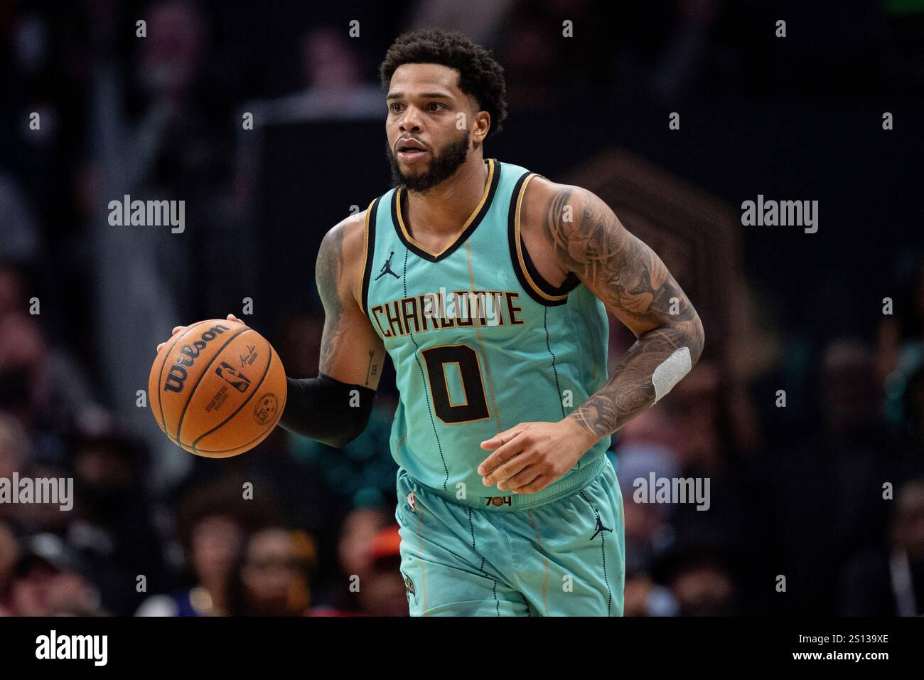 Charlotte Hornets forward Miles Bridges (0) brings the ball up court against the Chicago Bulls ...