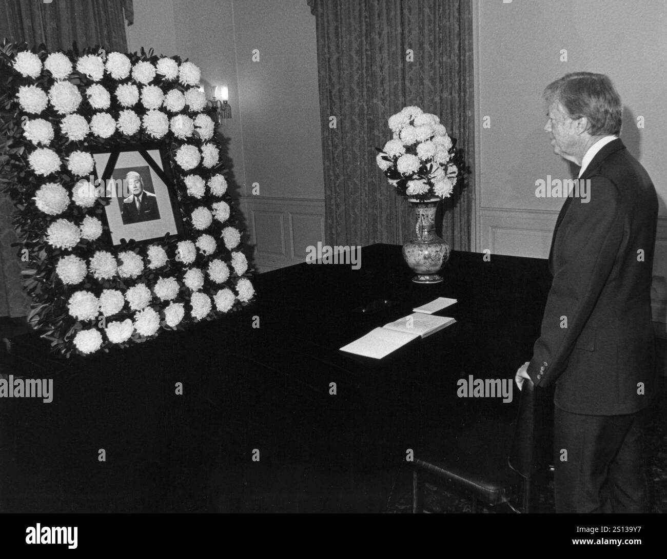 United States President Jimmy Carter pays his respects on the occasion ...