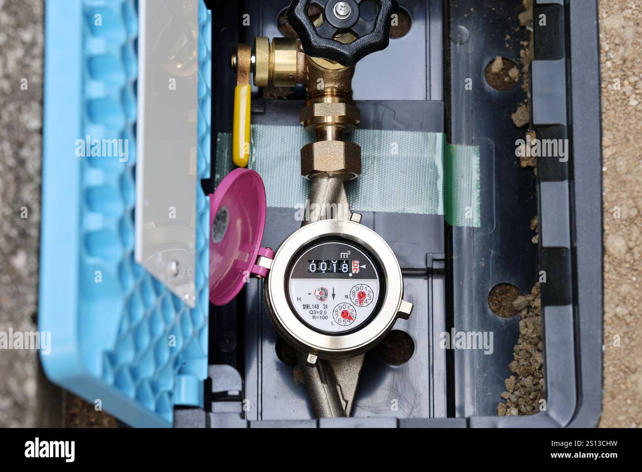 Gauge for water consumption, A water meter in the soil of at home at ...