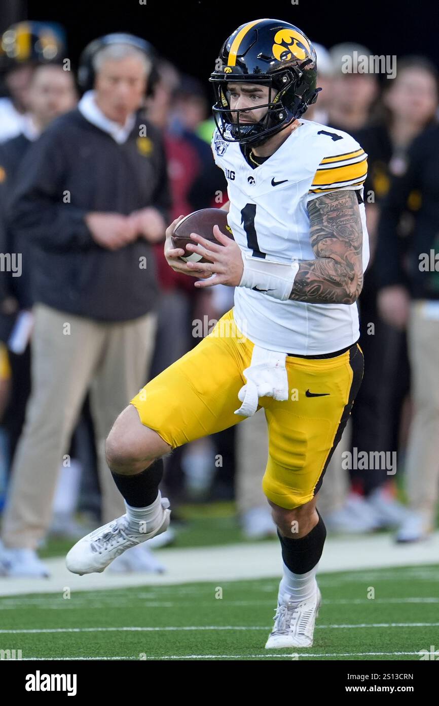 Iowa quarterback Brendan Sullivan (1) plays during the first half of ...