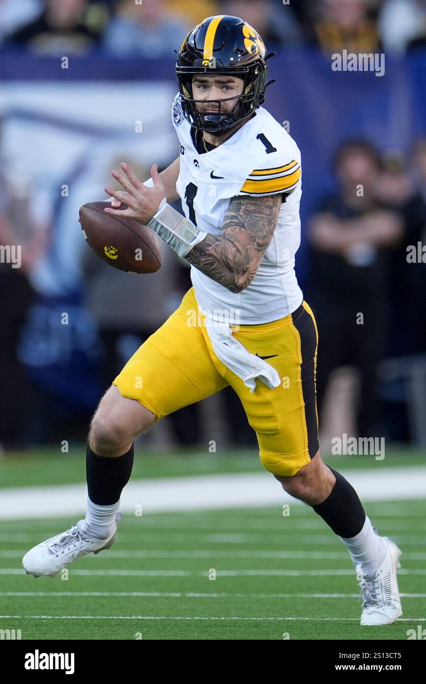 Iowa quarterback Brendan Sullivan (1) plays during the first half of ...