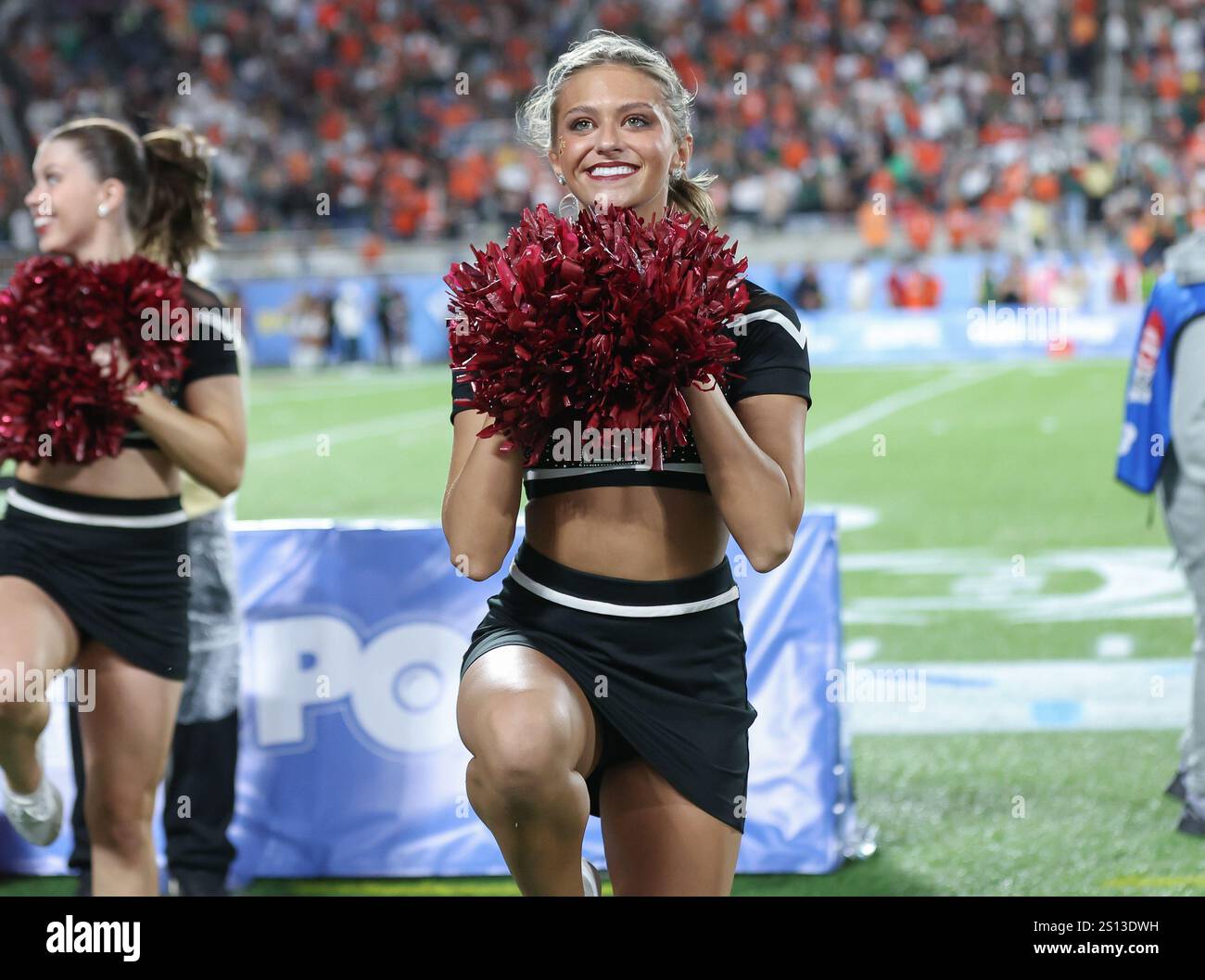 Orlando, FL, USA. 28th Dec, 2024. An Iowa State Dance Team member ...