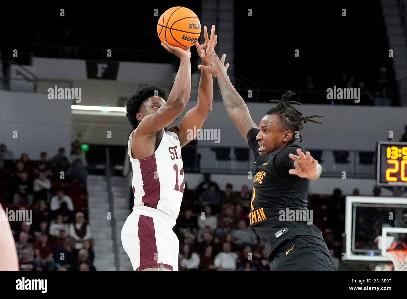 Mississippi State guard Josh Hubbard (12) shoots over the defense of ...