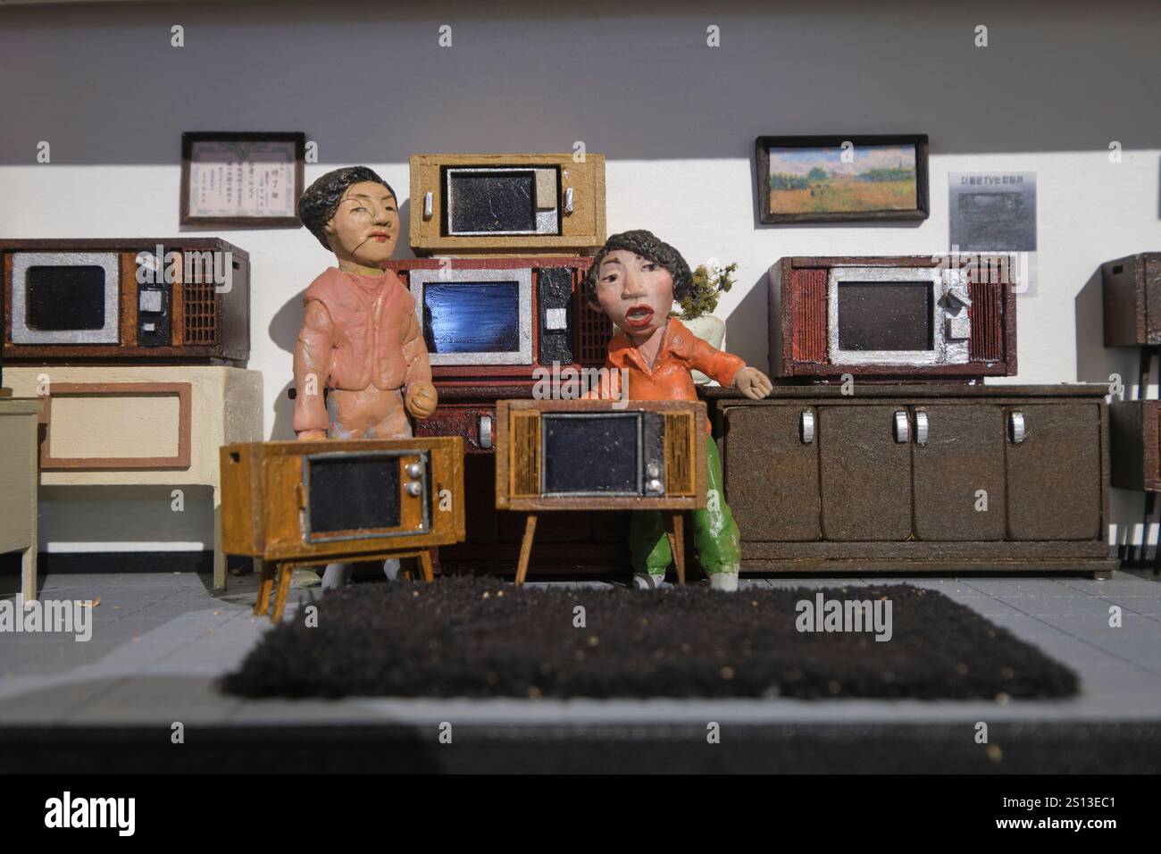 A TV, television shop. A diorama of the Sewoon Market mixed use ...
