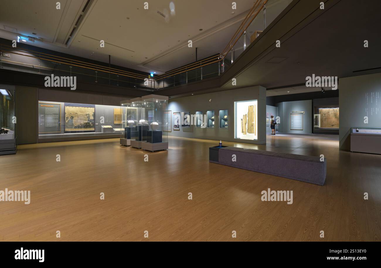 A gallery, room displaying ancient texts, vases. At the Seoul Museum of ...