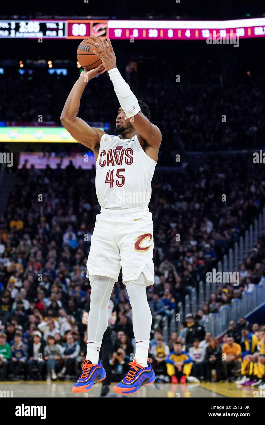 Cleveland Cavaliers guard Donovan Mitchell attempts a 3-point basket ...