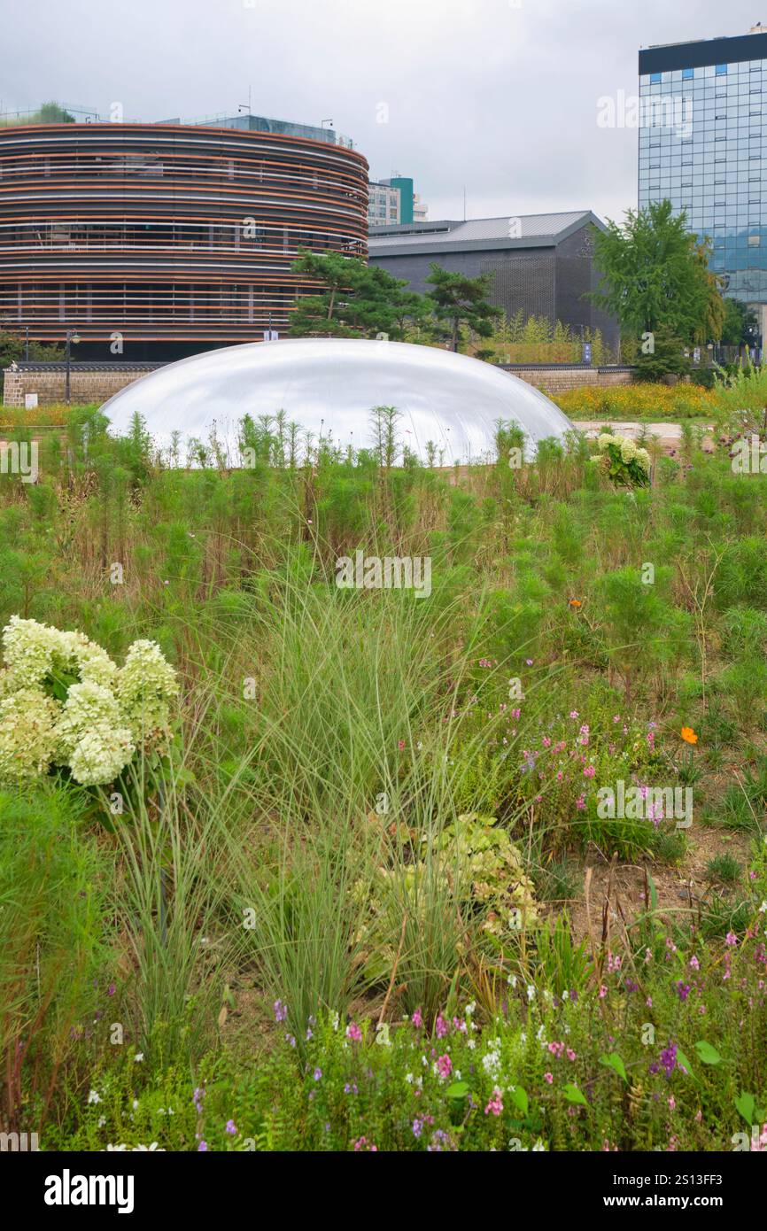 A big, silver sphere, orb structure, spacey. At the temporary Land ...