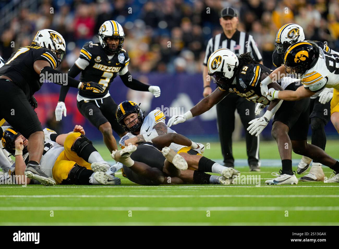 The Missouri defense sacks quarterback Brendan Sullivan (Iowa Hawkeyes ...