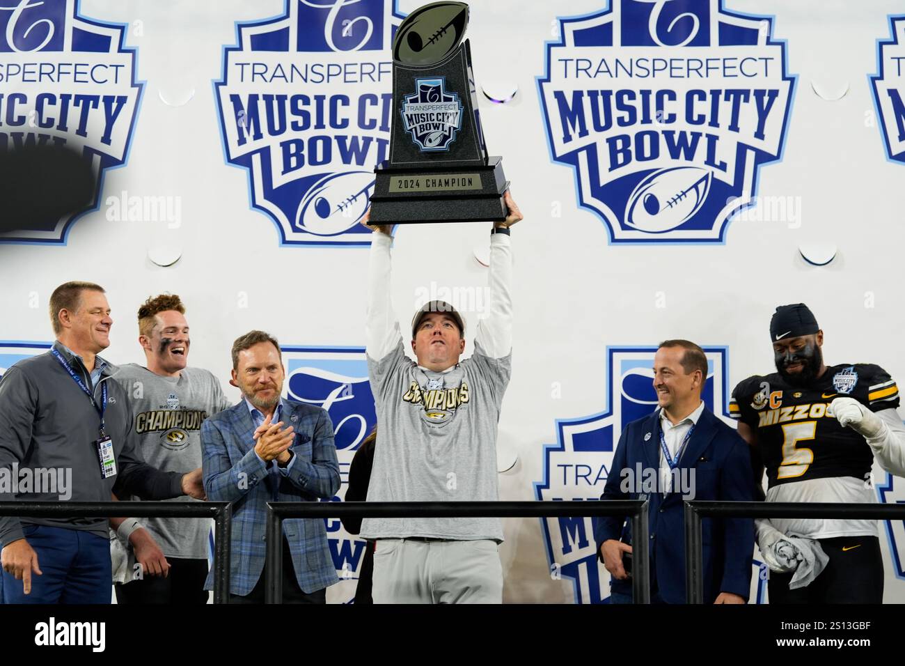 Head coach Eliah Drinkwitz of the Missouri Tigers lifts the Music City ...