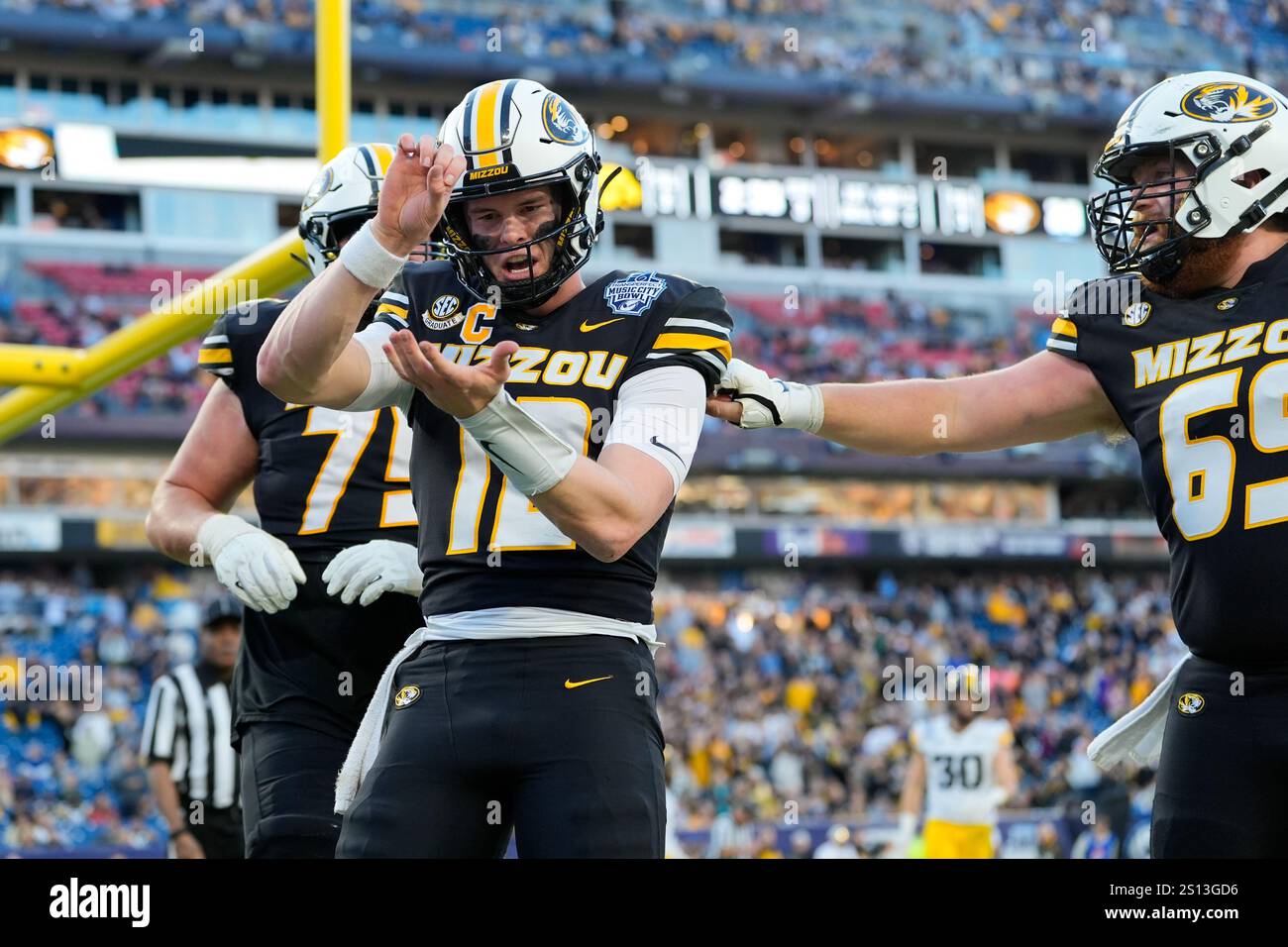 Quarterback Brady Cook (Missouri Tigers, #12) reacts in celebration ...