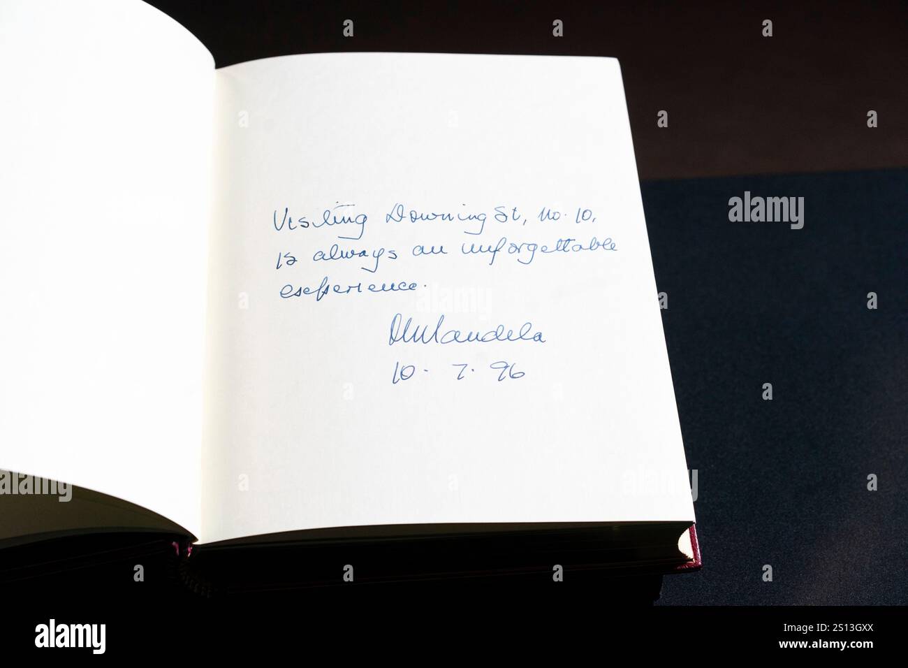 The signature of Nelson Mandela is seen in one of three Downing Street ...