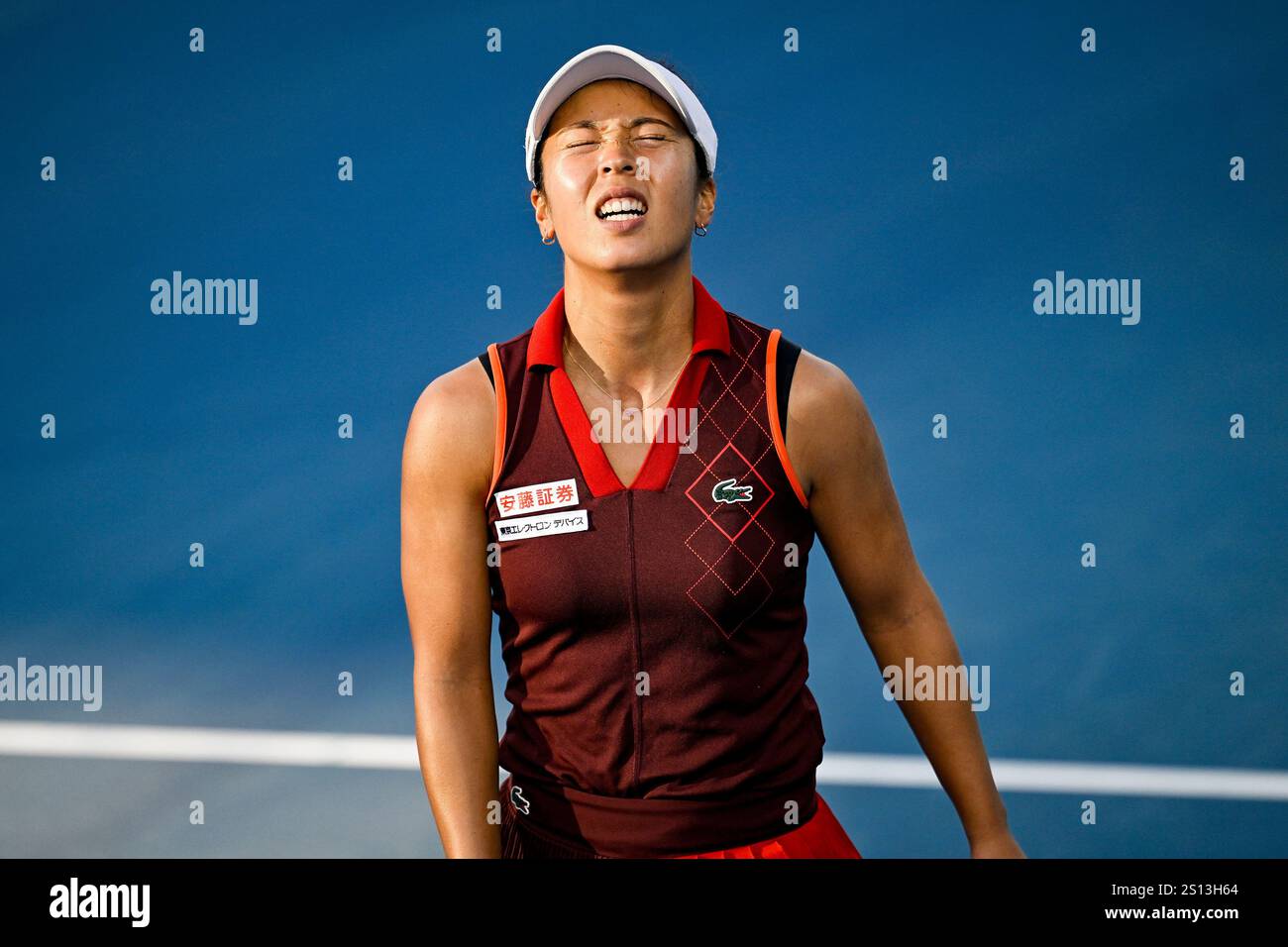 Mai Hontama of Japan reacts during her game against Robin Montgomery of ...