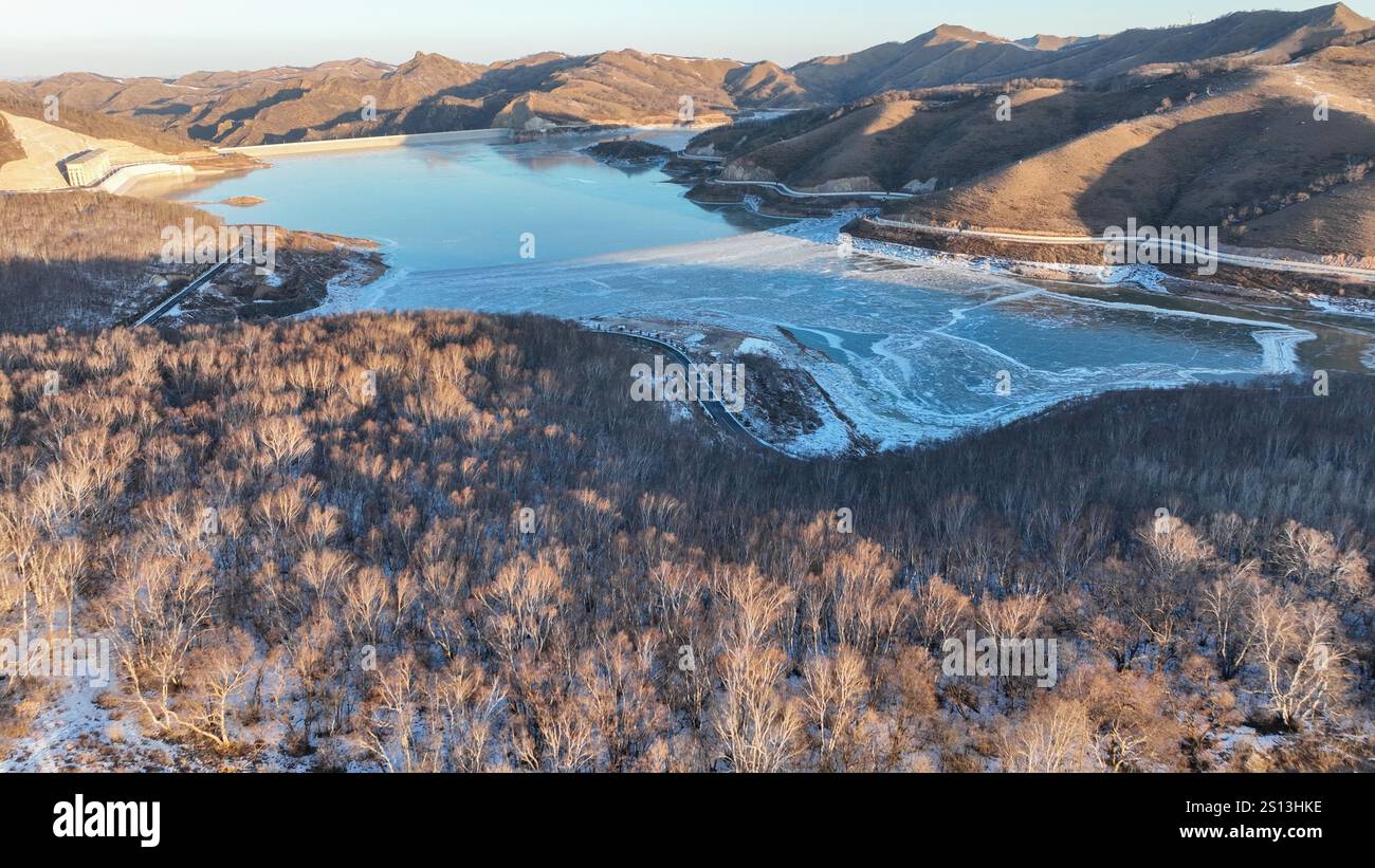 (241231) -- FENGNING, Dec. 31, 2024 (Xinhua) -- A drone photo taken on ...