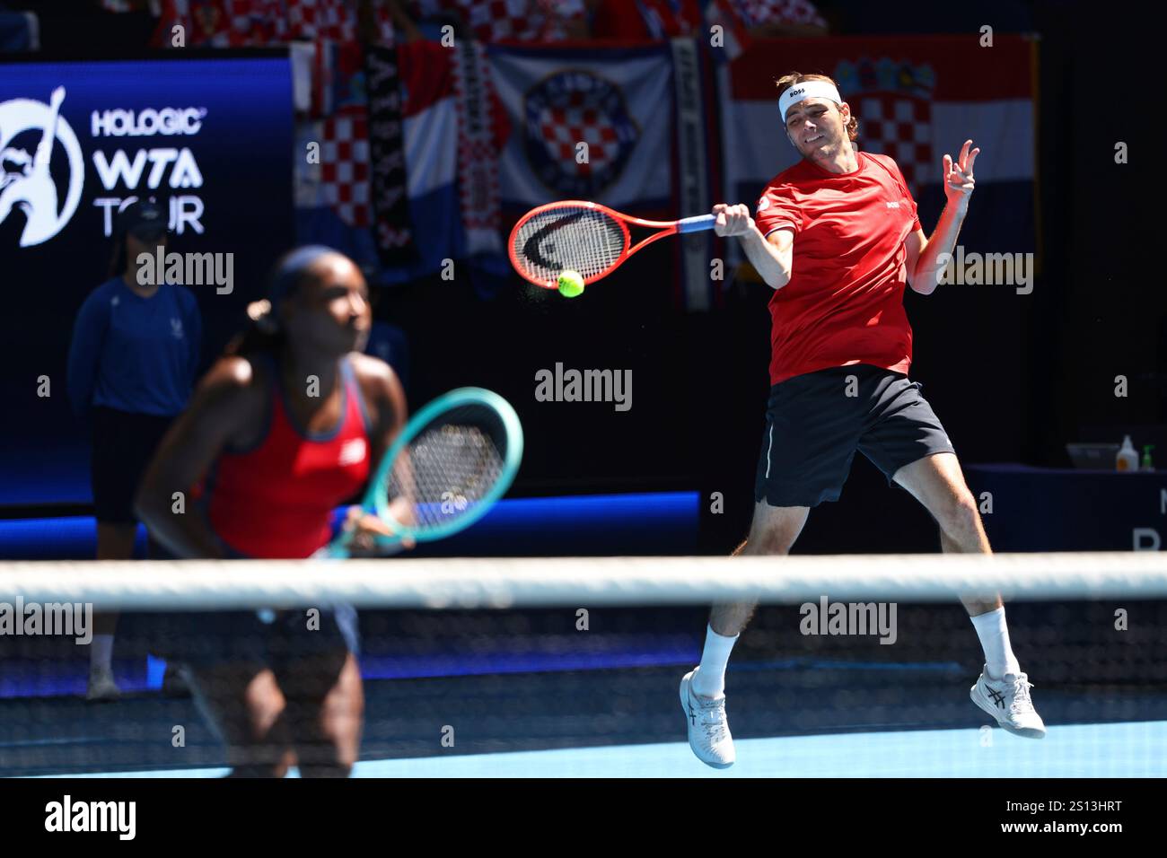 Taylor Fritz and Coco Gauff of the United States play against Petra ...