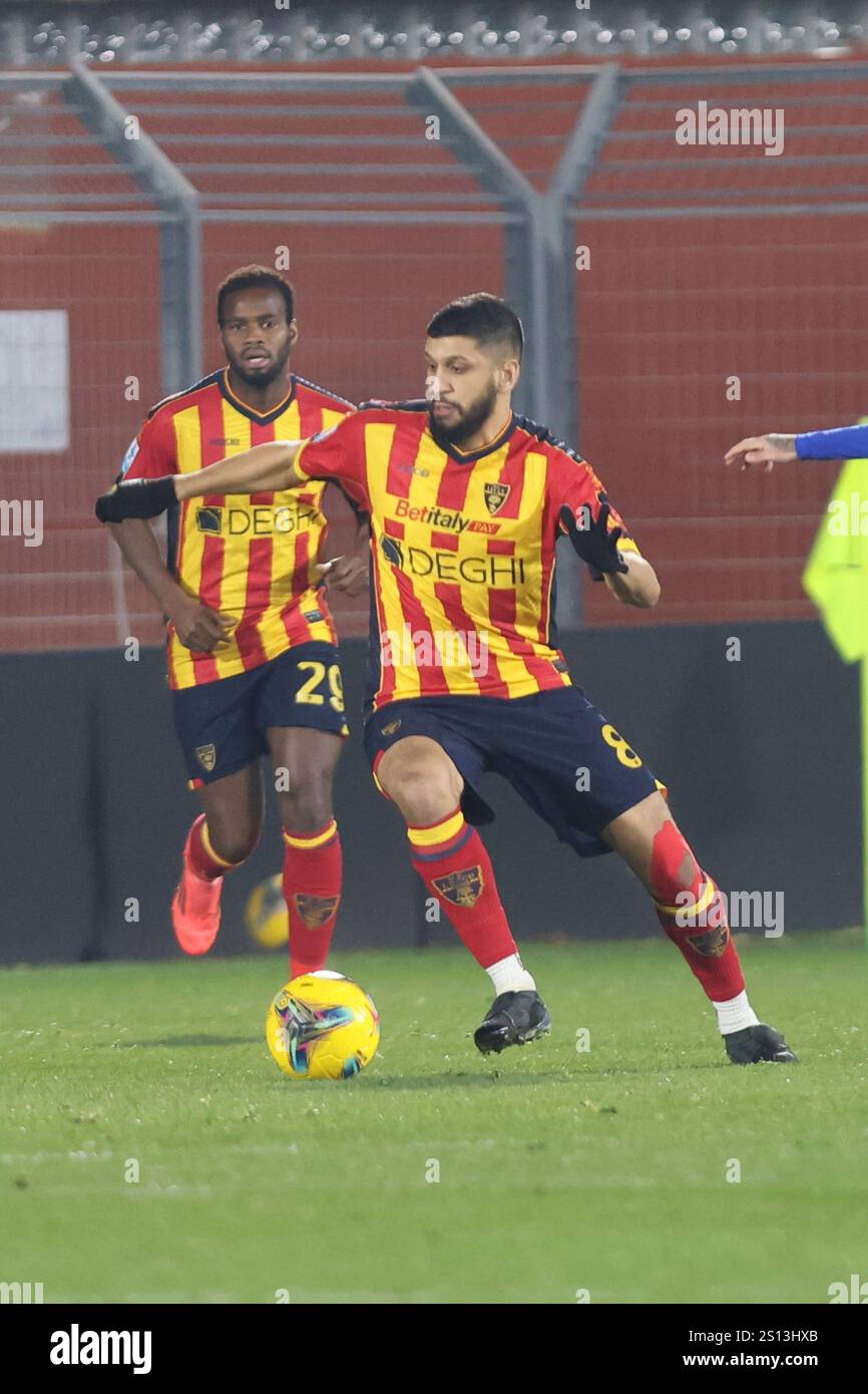 Como, Italia. 30th Dec, 2024. Como's US Lecce's Hamza Rafia in action ...