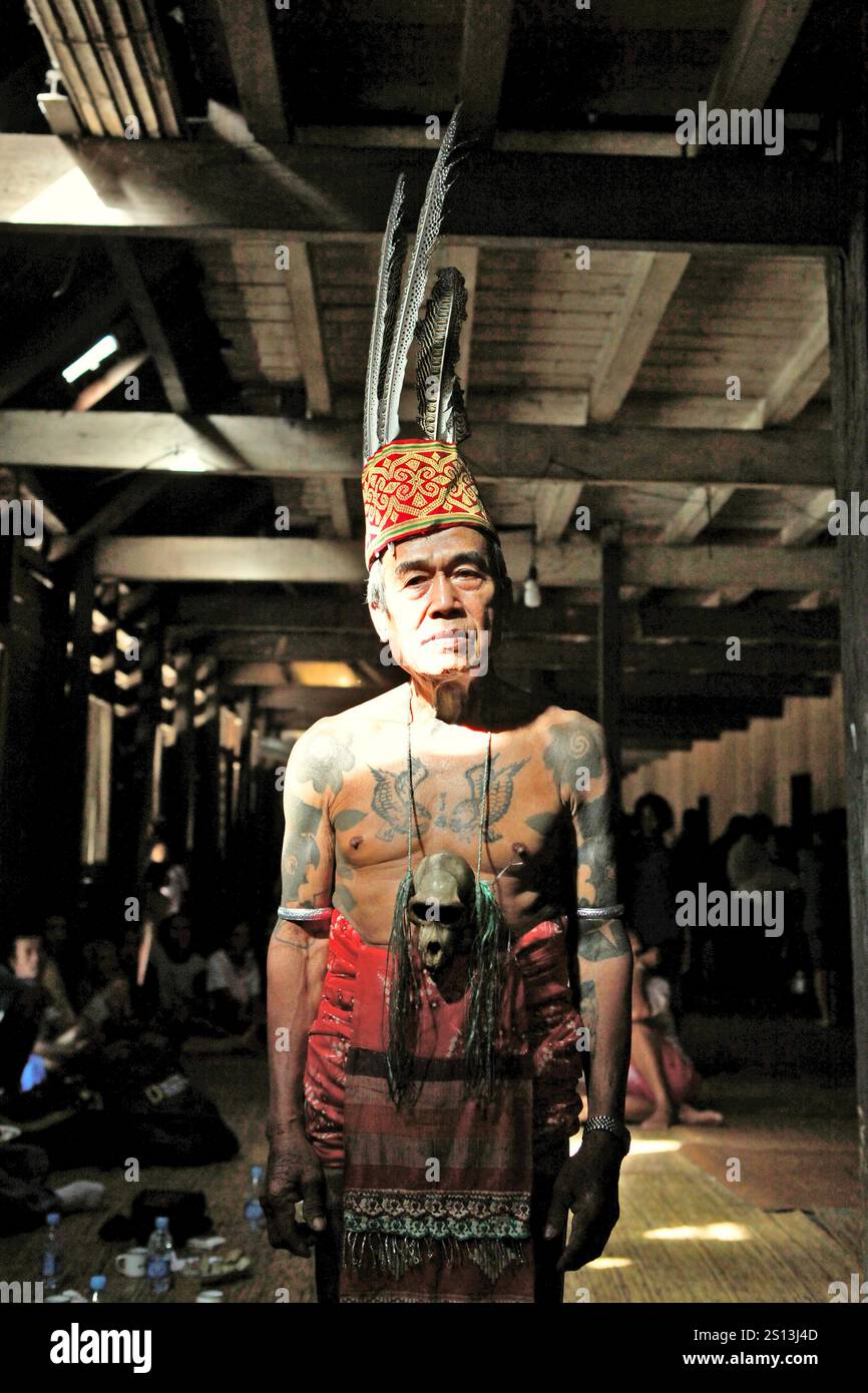 Portrait of Ramping, an elder, in traditional attire after the welcome ...