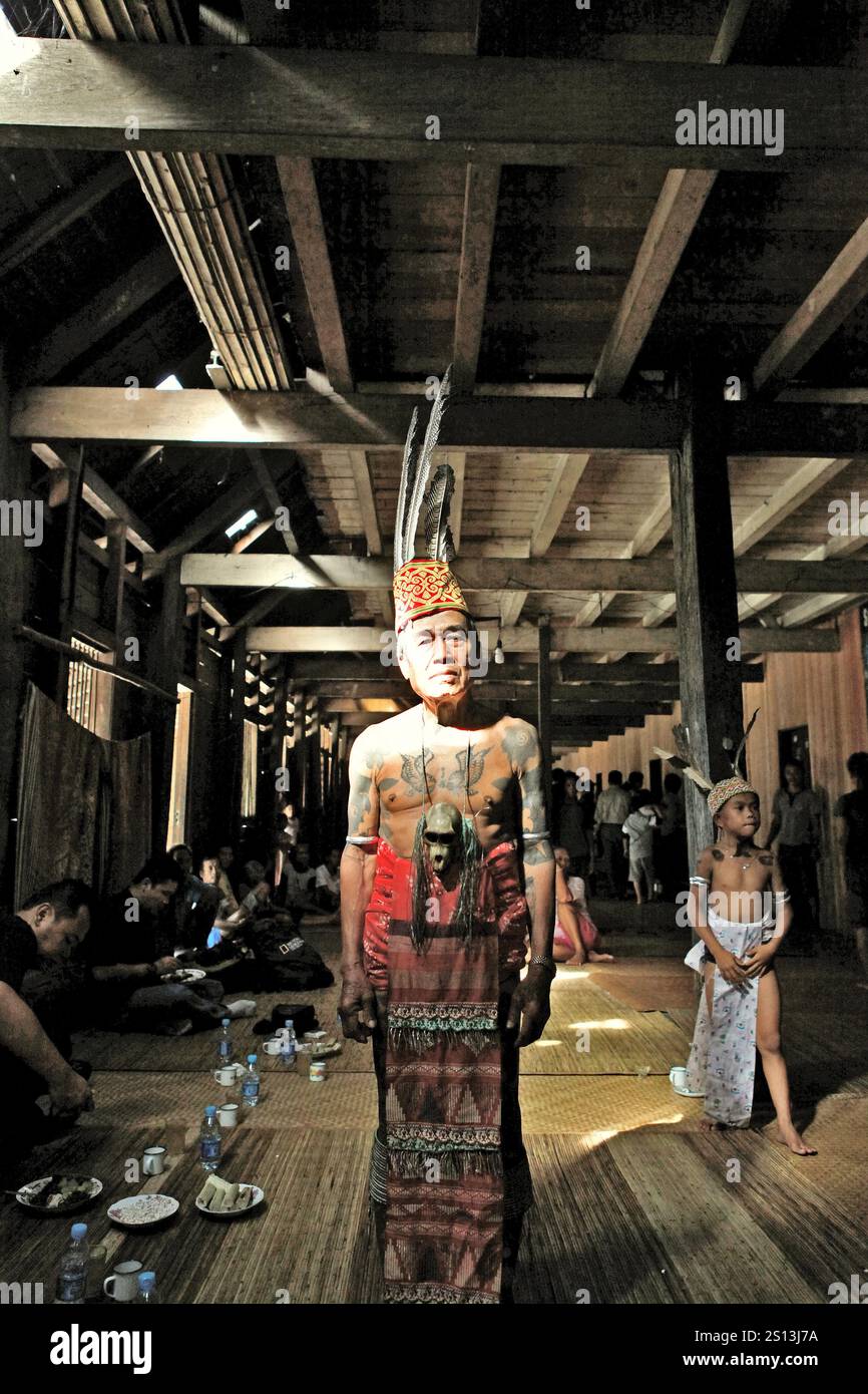 Portrait of Ramping, an elder, in traditional attire after the welcome ...