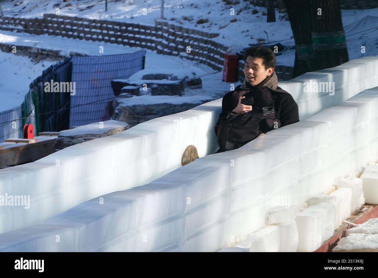 Tourists experience ice and snow sports at a park in Beijing, China, 27 ...