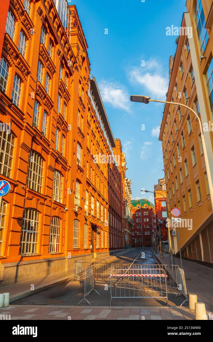 4 th Golutvinsky Lane, brick building with large white windows. Narrow ...