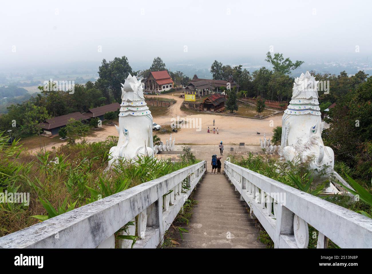 The big white Buddha temple in fog, Pai Town, Thailand Stock Photo - Alamy