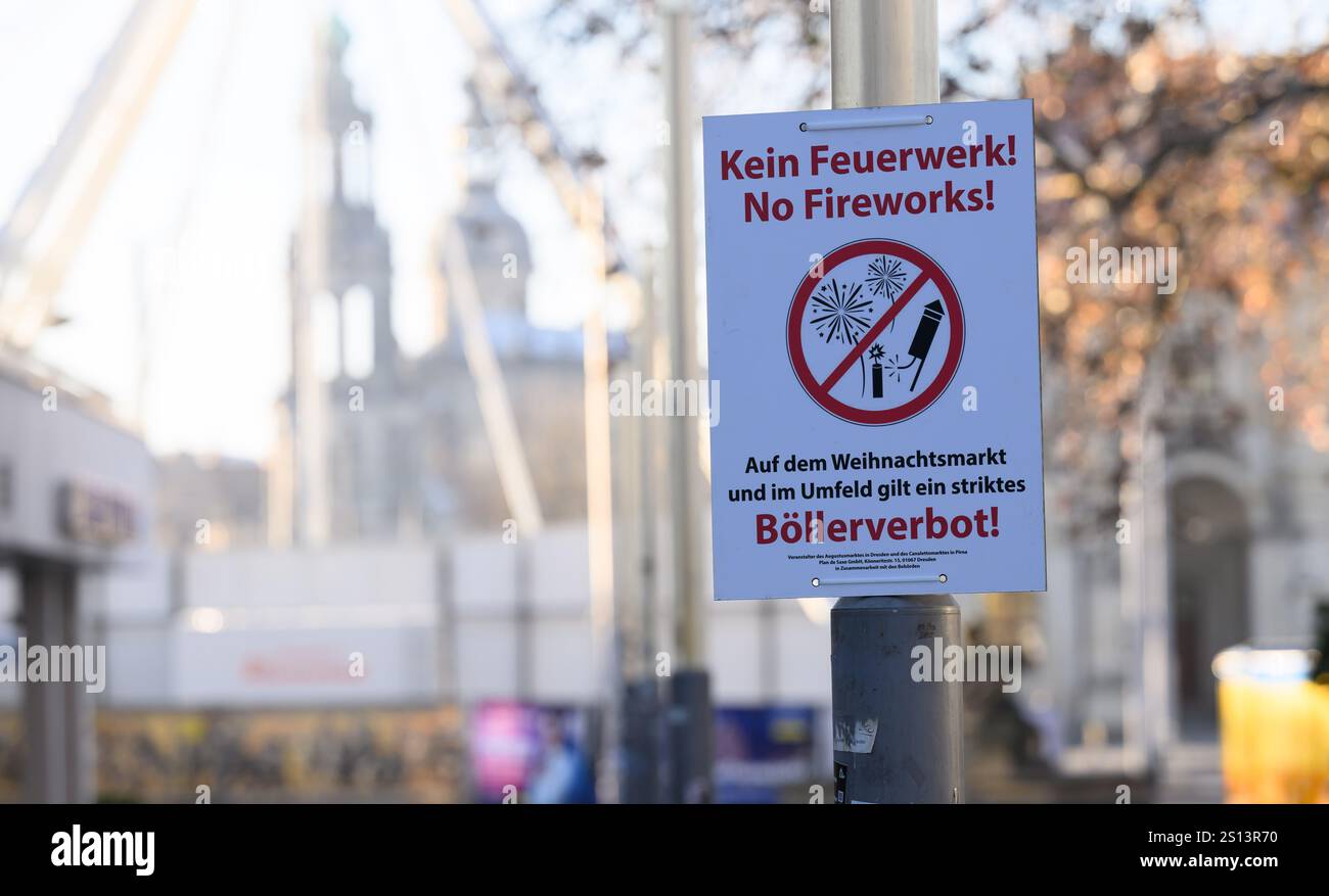 Dresden, Germany. 31st Dec, 2024. A "No firecrackers" sign hangs on a ...