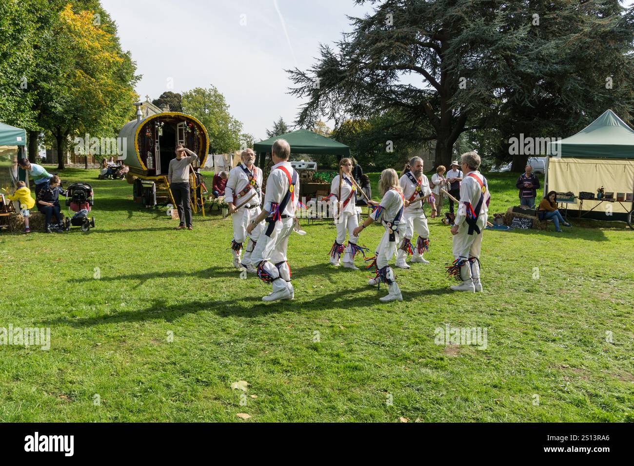 Men and women Morris Dancers performing at a country fair, Canons Ashby ...