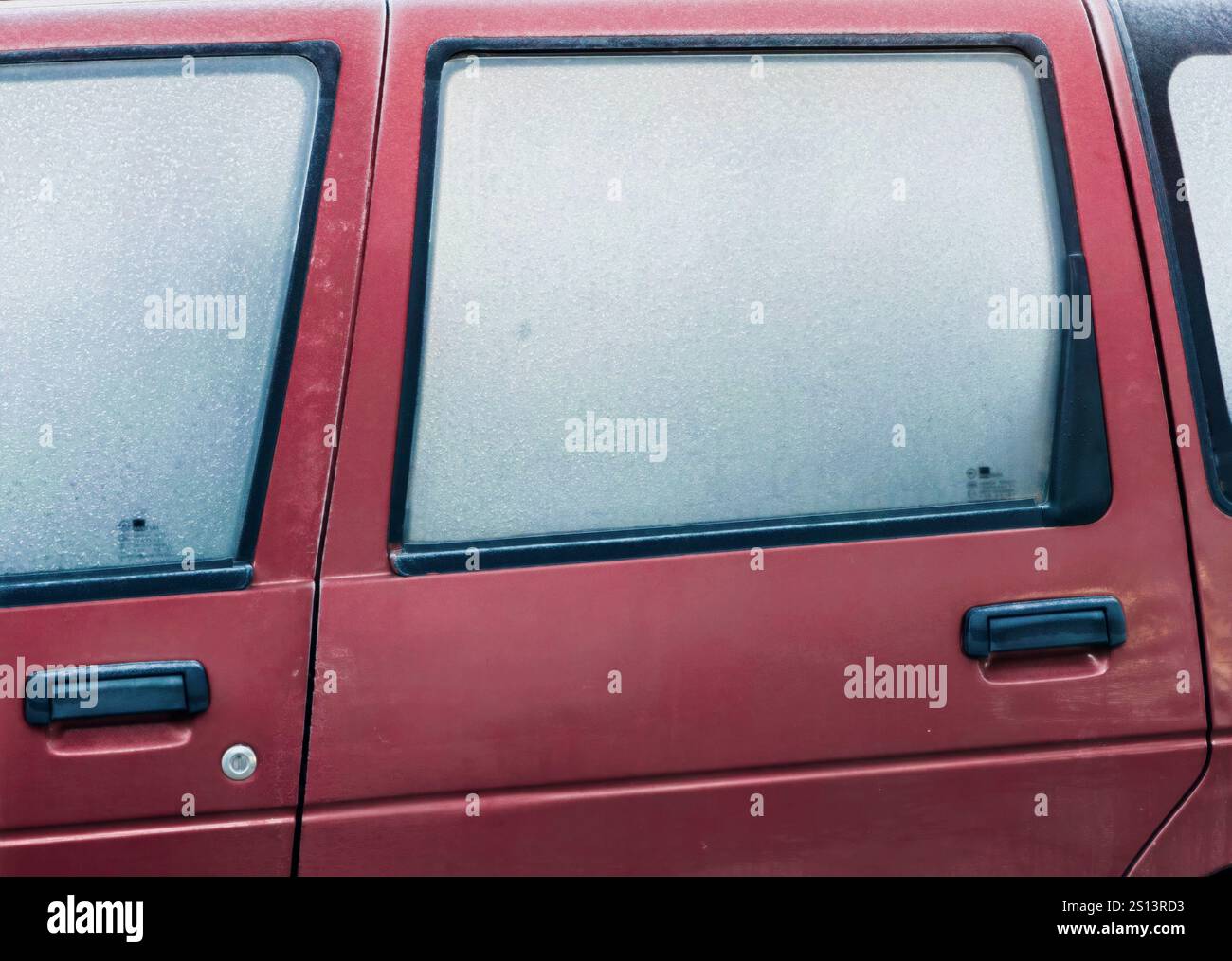 Frozen Patterns: Frosted Glass and Handle of a Parked Car Stock Photo ...