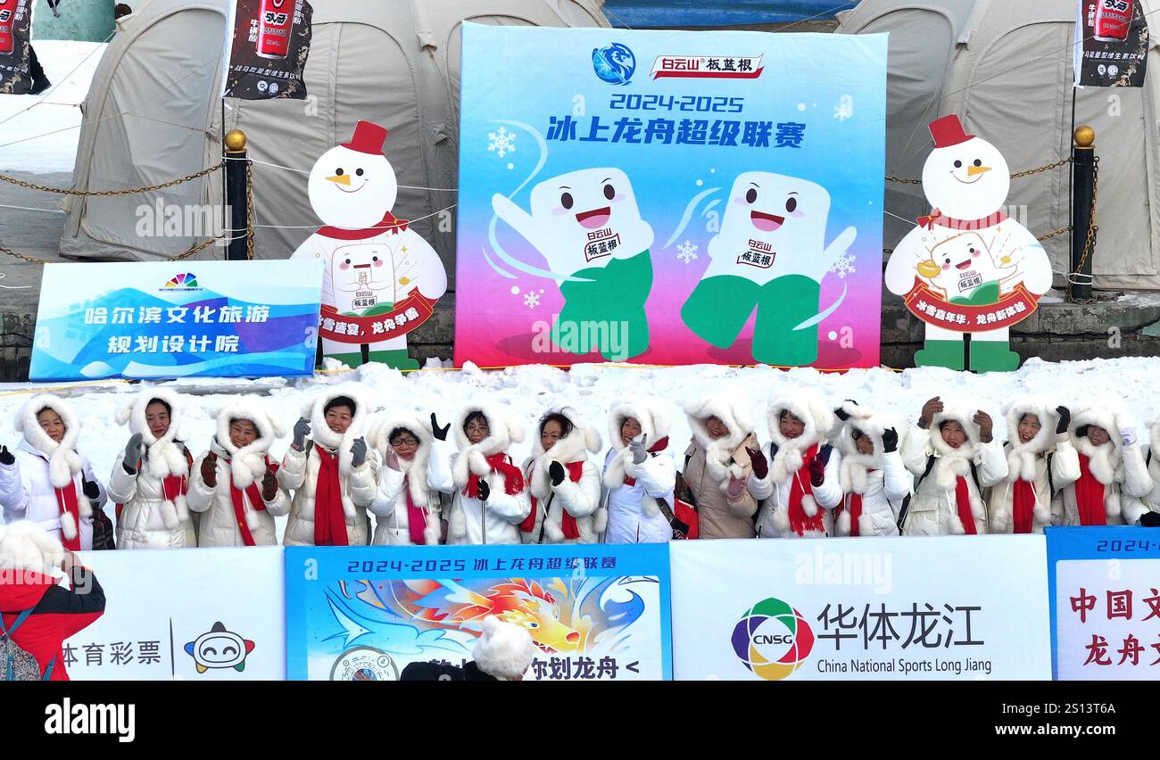 An ice dragon boat race at Hulan Estuary Wetland Park draws tourists in ...