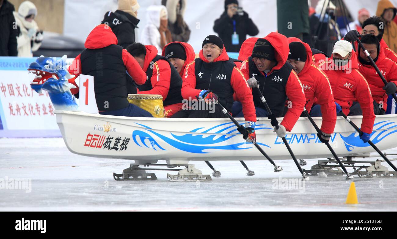 An ice dragon boat race at Hulan Estuary Wetland Park draws tourists in ...