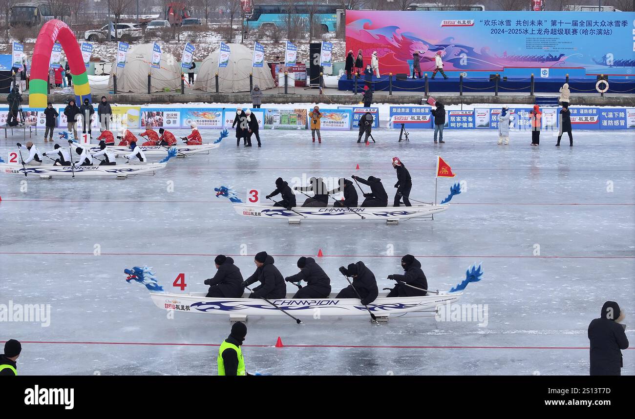 An ice dragon boat race at Hulan Estuary Wetland Park draws tourists in ...